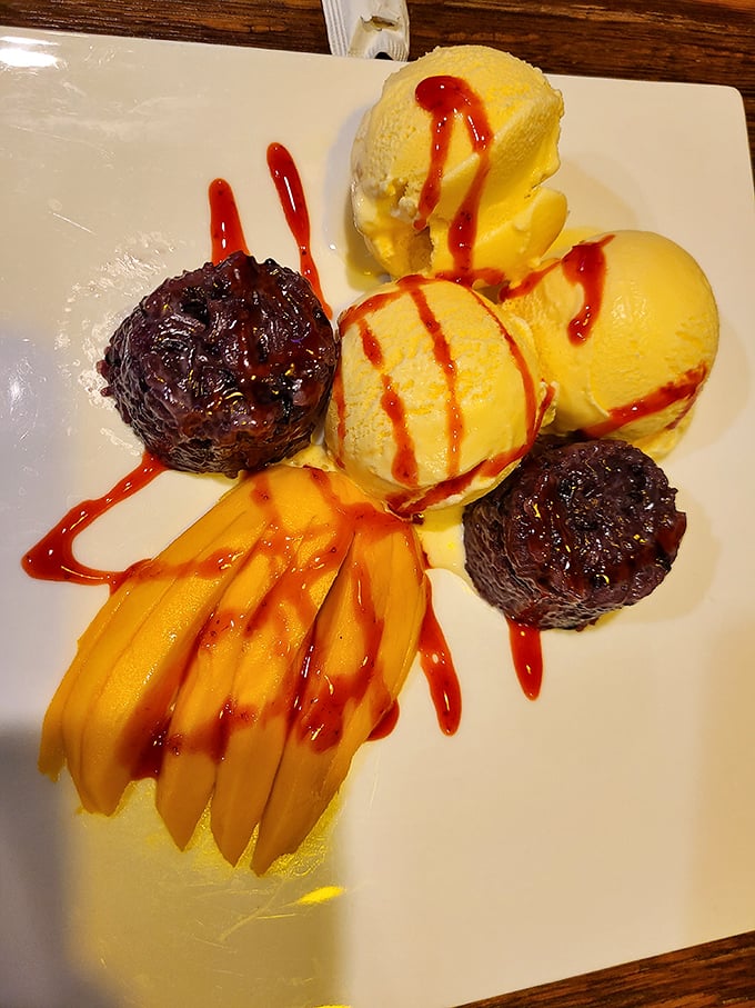 Mango sticky rice that's basically dessert nirvana&mdash;sweet mango slices, coconut-infused rice, and a drizzle of sauce that makes you forget about chocolate for once.