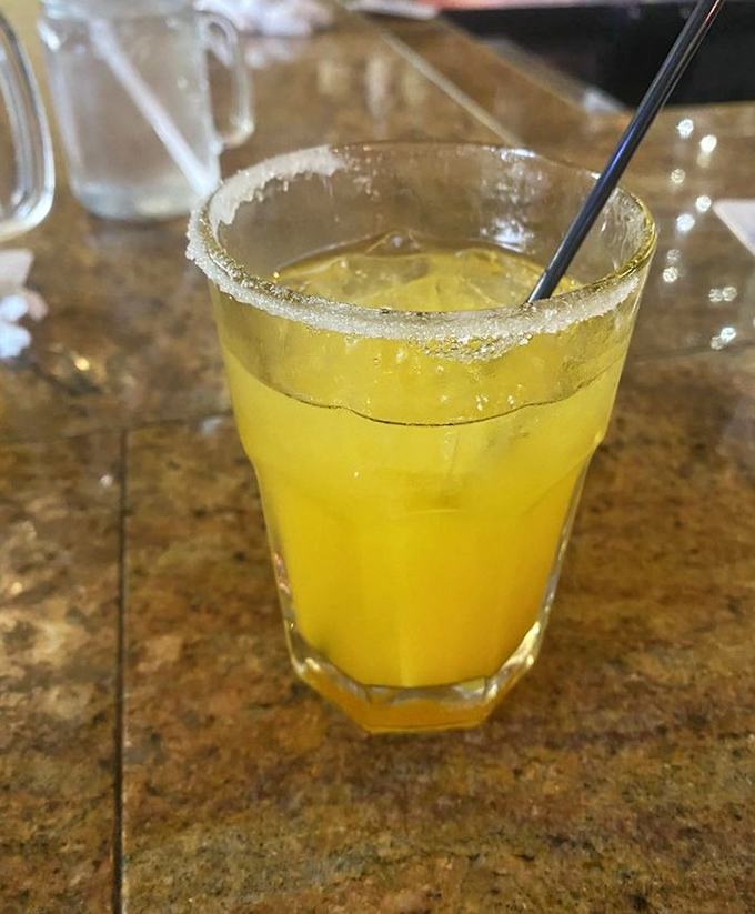 This sunshine-colored margarita with its salt-rimmed glass promises a southwestern fiesta in every sip. Liquid vacation, Arizona-style.