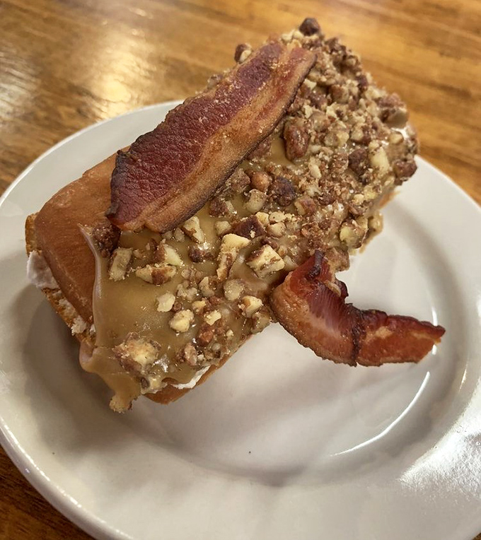 The maple pecan bacon long john&mdash;where breakfast and dessert collide in what might be the most beautiful accident in culinary history.