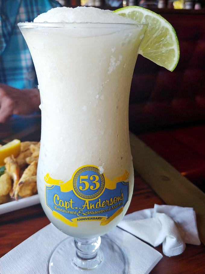 A frosty margarita in a commemorative glass&mdash;because sometimes the best souvenir isn't something you pack, but something you sip.