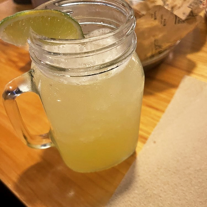 A mason jar margarita with a lime wedge perched on the rim&mdash;Florida's answer to "What pairs with everything on the menu?"