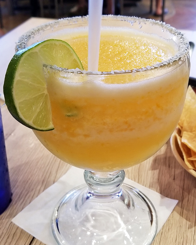 The margarita glass&mdash;half the size of your head, twice the fun of ordinary drinks. That lime isn't garnish; it's a necessary vitamin supplement.