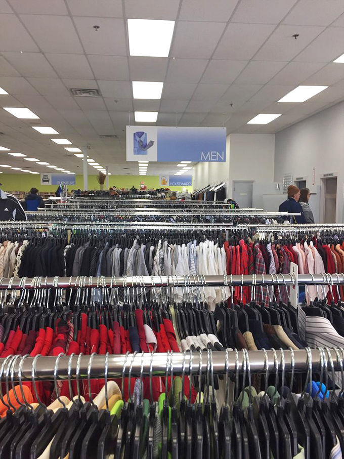 The men's section: where dress shirts that once attended important meetings now wait patiently for their next career opportunity.