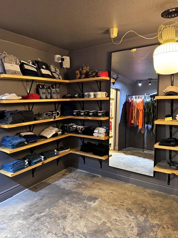 Industrial-chic shelving displays men's clothing with the kind of organization that makes shopping feel less like a chore and more like discovery.