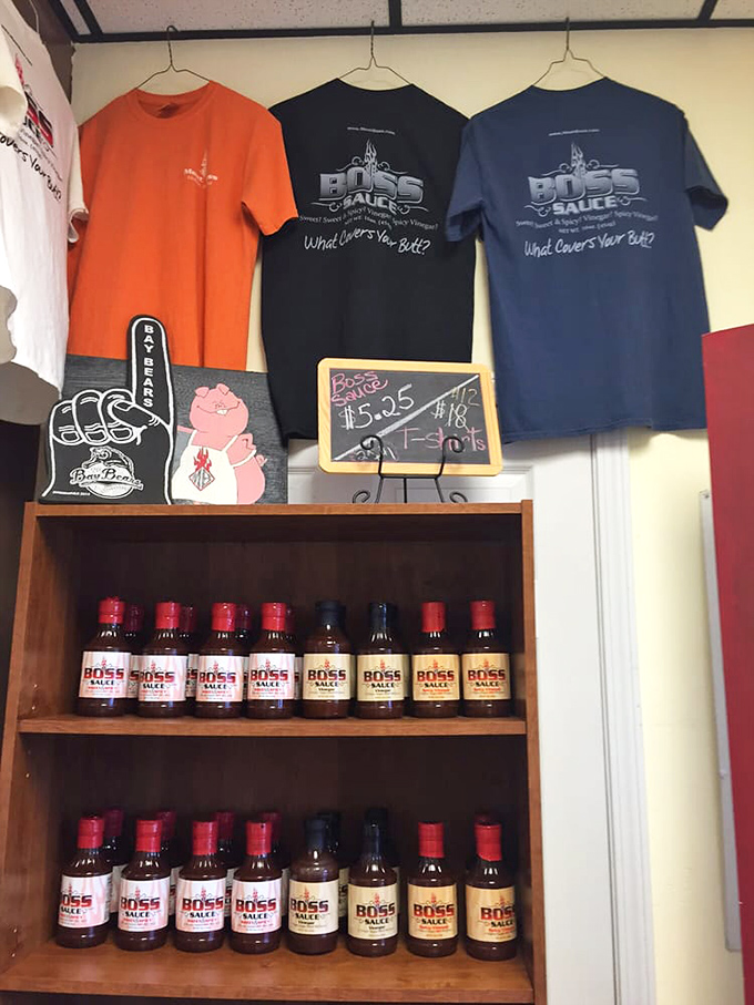 The wall of sauces and merch&mdash;because the only thing better than eating great barbecue is taking some of its magic home.