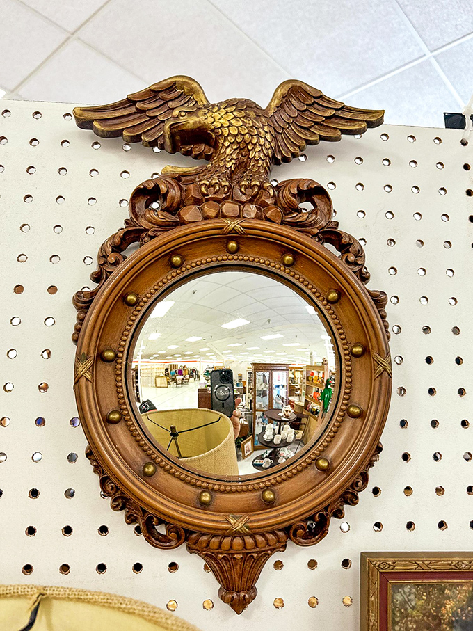 This eagle-topped mirror has witnessed more history than most history books contain. Reflections of the past and present merge in its ornate golden frame.