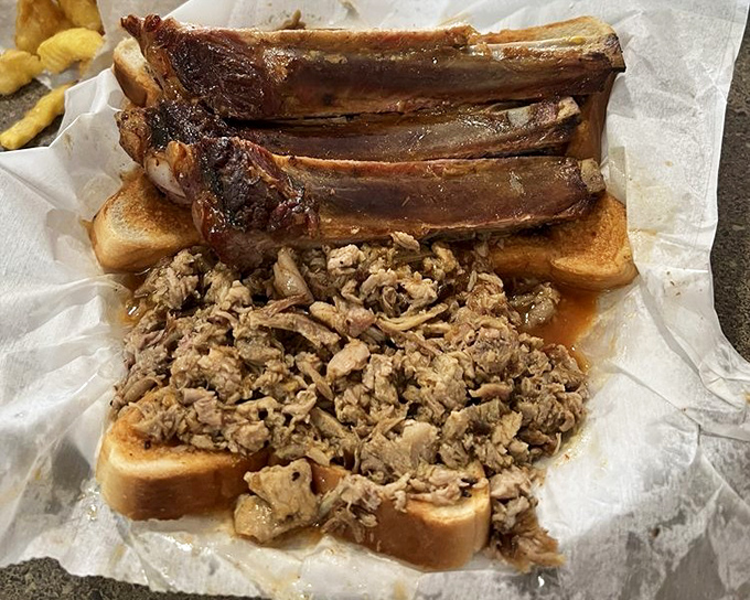 Ribs and chopped pork on white bread &ndash; a combination so perfect it makes you question why we ever invented plates.