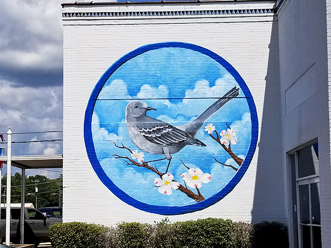 The mockingbird mural captures the town's literary soul in vibrant blues, a painted reminder of Monroeville's place in American literature.