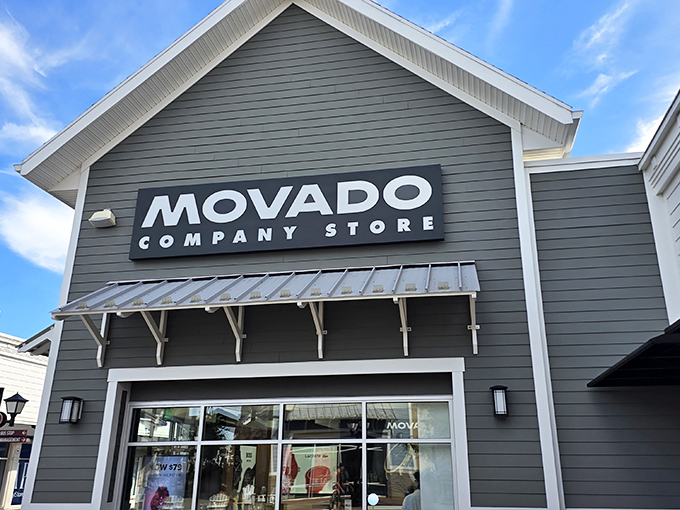 Movado's sleek storefront promises timepieces that say "I have excellent taste" without saying "I've made questionable financial decisions."