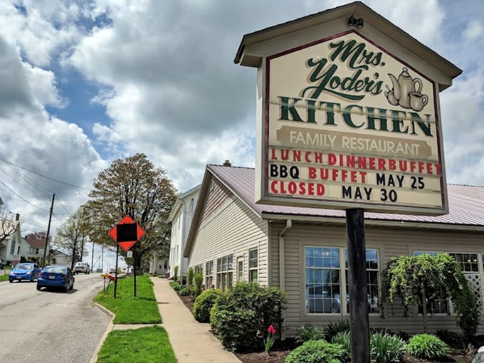 The sign says it all. Mrs. Yoder's Kitchen promises buffets that make you question why you ever thought small portions were sophisticated.
