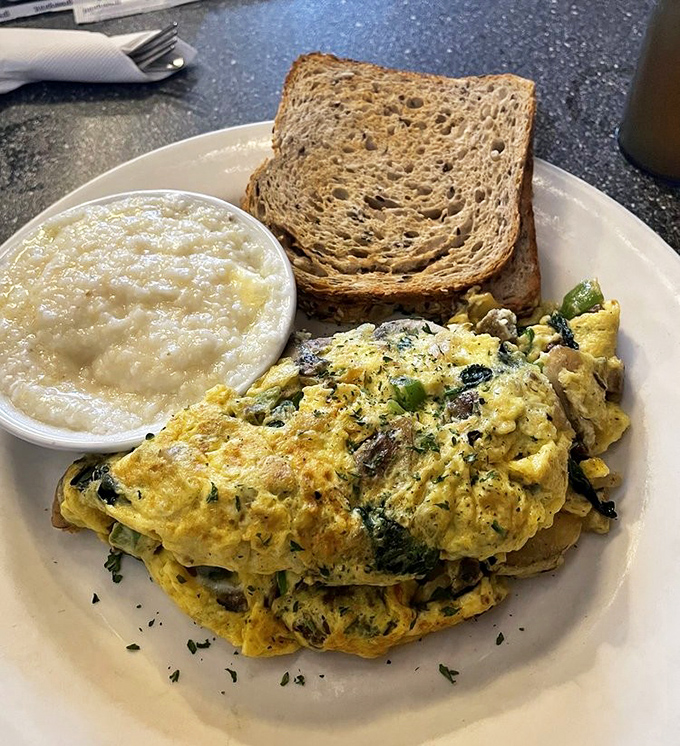 This isn't just an omelet &ndash; it's a masterclass in egg architecture, where vegetables and cheese find their higher purpose.