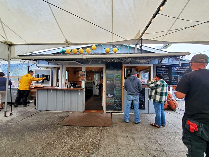 The order window at Sea Pal Cove, where magic happens and deep-fried cheesecake orders are placed with zero judgment.