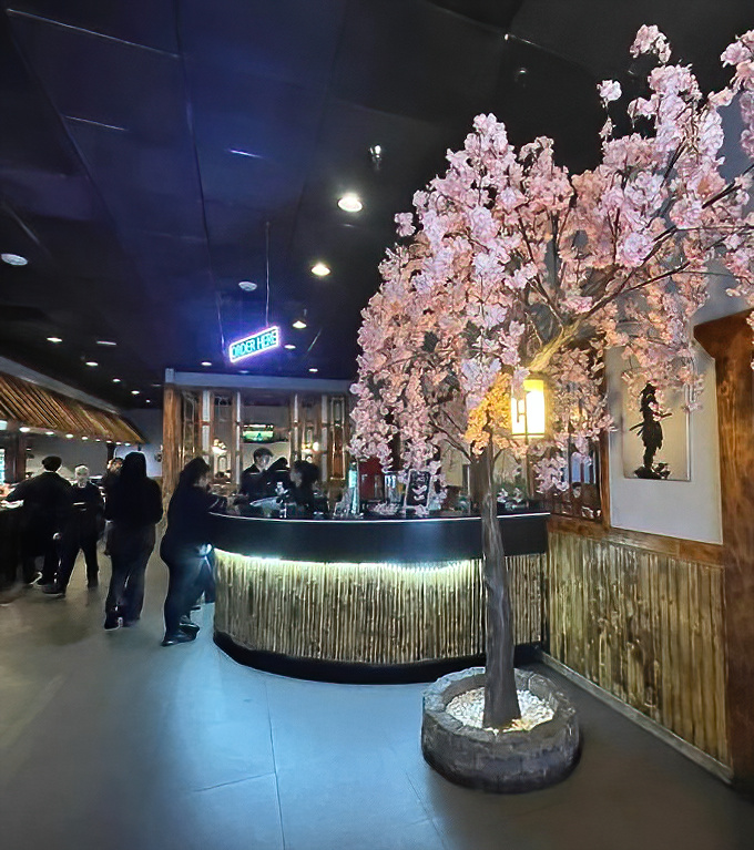 Where sushi dreams begin! The cherry blossom tree isn't just decoration; it's nature's way of saying "something wonderful is about to happen to your taste buds."