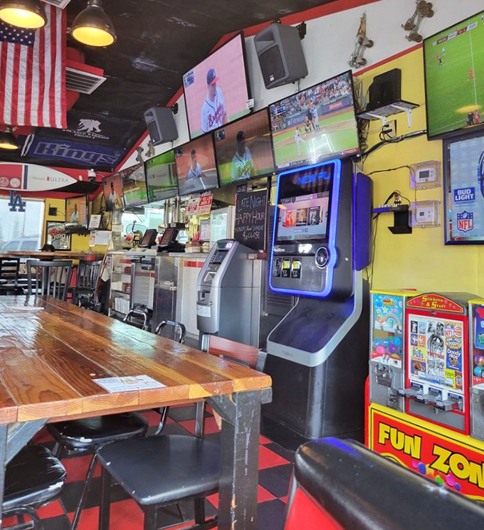 The interior feels like sports bar meets family diner, with enough screens to ensure you won't miss a play while savoring your burger.