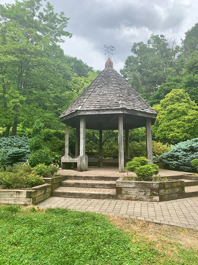 This rustic gazebo offers shelter from sudden summer showers and the perfect backdrop for impromptu family photos.
