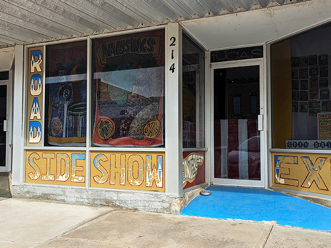The storefront's hand-painted "SIDE SHOW" signage evokes the golden age of traveling carnivals, when wonder waited behind every ticket booth.