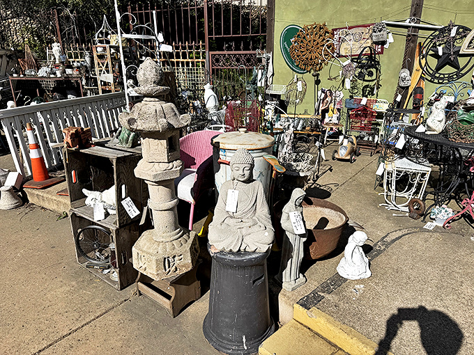 Garden statuary and architectural salvage bask in California sunshine. That Buddha has the serene look of someone who's seen it all.