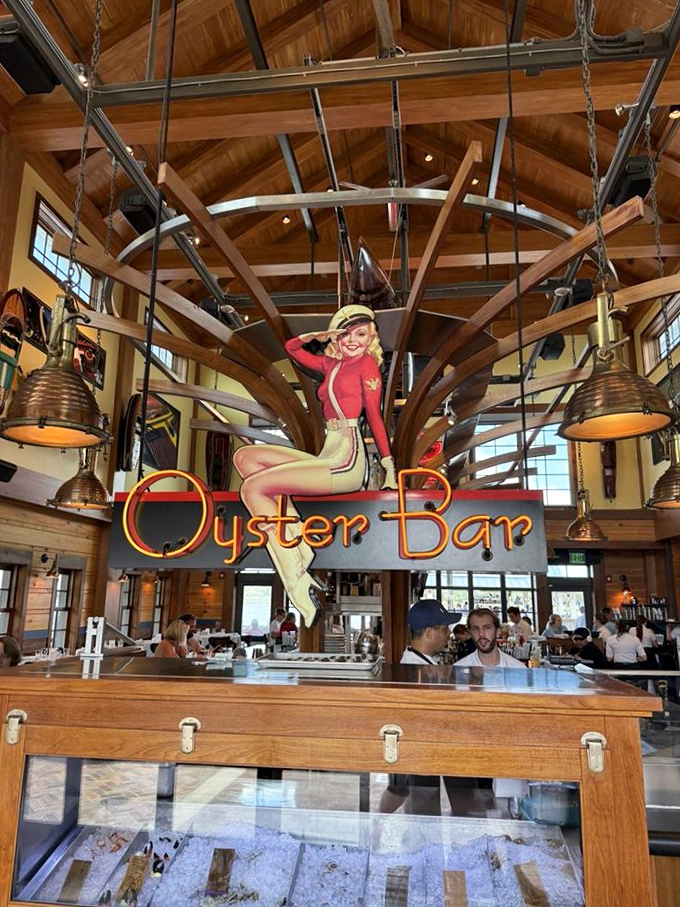 The Oyster Bar's vintage pin-up sign and soaring wooden beams create the perfect backdrop for slurping briny treasures from their shells.