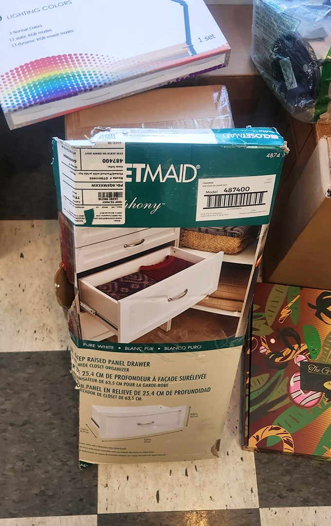 Home organization solutions still in their boxes &ndash; proof that good intentions for tidiness are universal and recyclable.