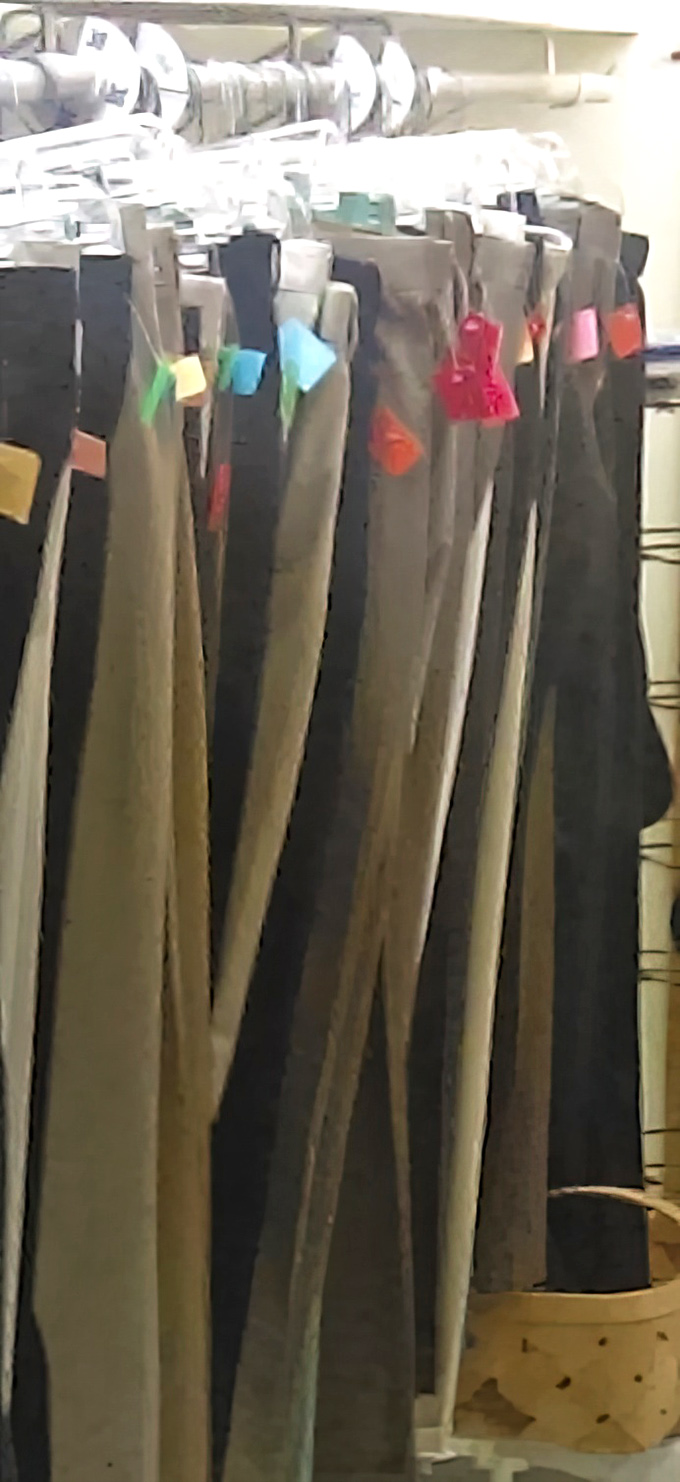 The pants section is color-coded with tags for easy size identification. Marie Kondo would approve of this organizational magic.