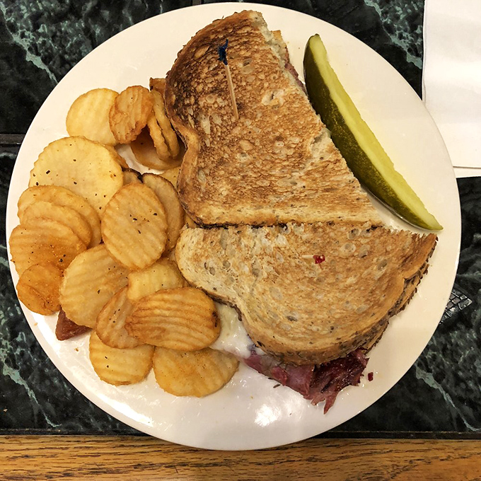 A sandwich that's achieved perfect balance &ndash; crispy grilled bread, tender meat, and just enough cheese to make you temporarily forget about your cholesterol numbers.