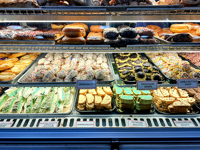 A pastry case that makes choosing just one item mathematically impossible. The Italian cookie selection alone requires advanced decision-making algorithms.