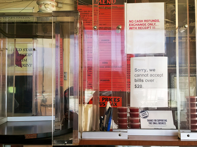 The payment window speaks volumes: cash only, no bills over $20, and absolutely no regrets about what you're about to experience.