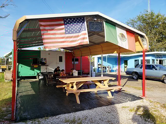This colorful outdoor dining spot flies multiple flags, celebrating the international language we all understand &ndash; good food shared outdoors.