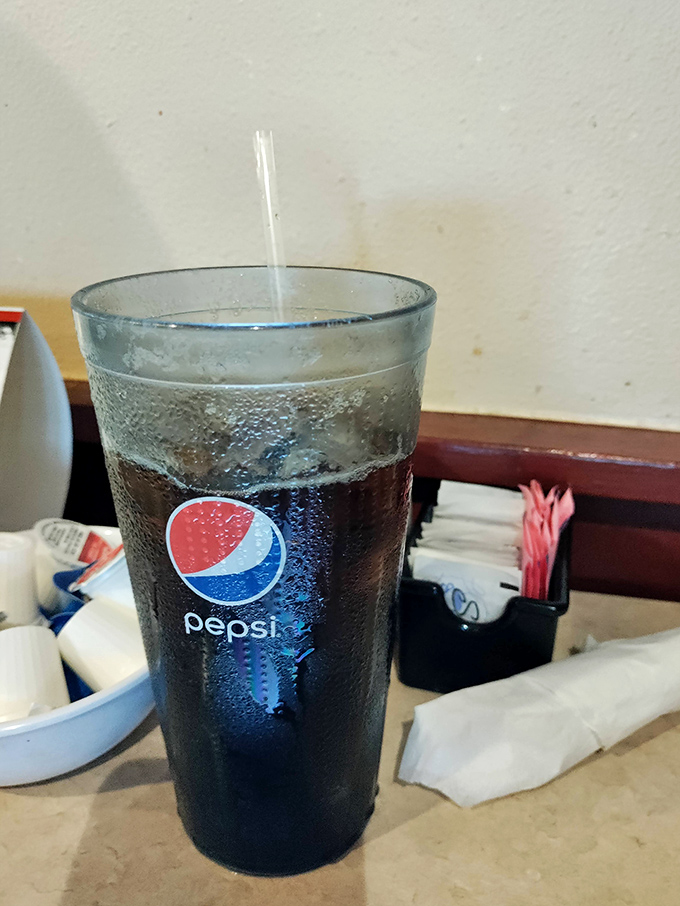 That condensation on the Pepsi glass isn't just moisture &ndash; it's the visual soundtrack to Florida's heat and the promise of sweet, cold relief.