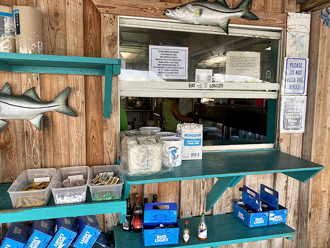 The pick-up window&mdash;where seafood dreams come true. No-frills service that lets you know the focus is where it should be: on what's coming out of the kitchen.