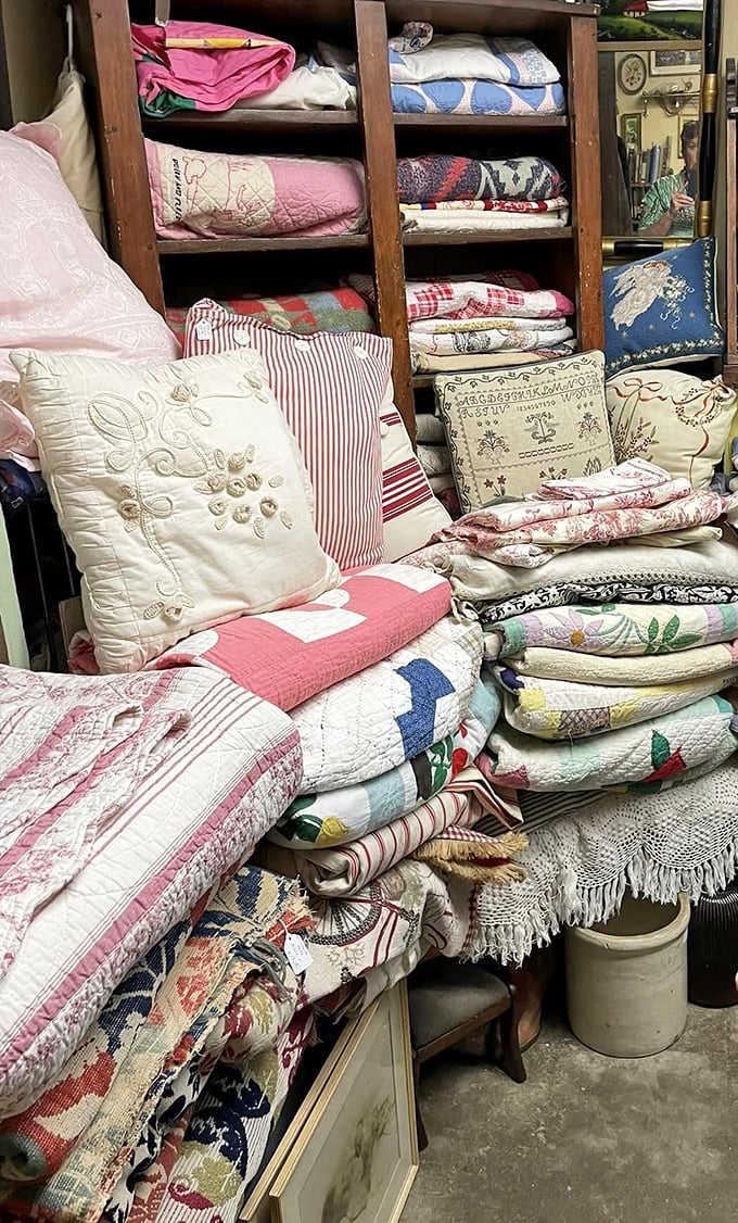 Quilts and pillows stacked like colorful layer cakes&mdash;each one hand-stitched with patience our modern world has forgotten how to practice.