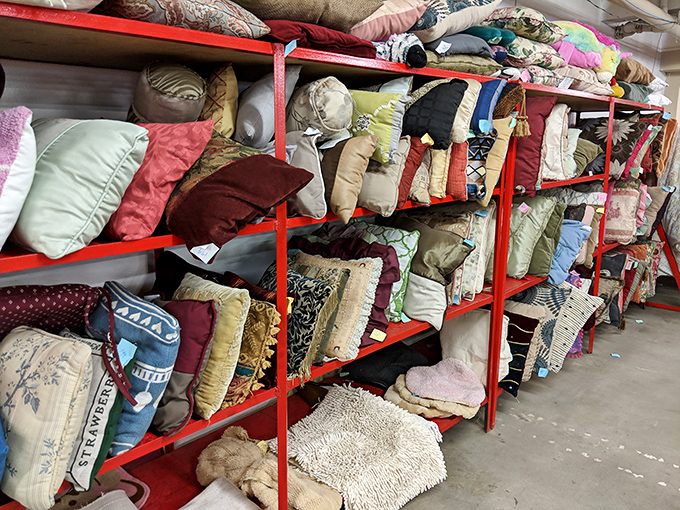 The pillow mountain! A textile testament to changing home décor trends and the eternal human desire to rest comfortably.