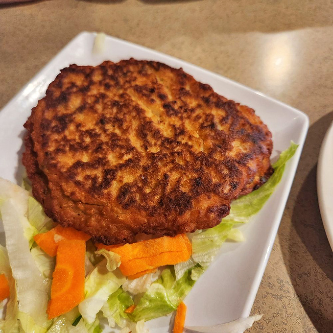 A potato pancake that's achieved the perfect crispy exterior while maintaining that tender interior &ndash; the Goldilocks zone of potato preparation.