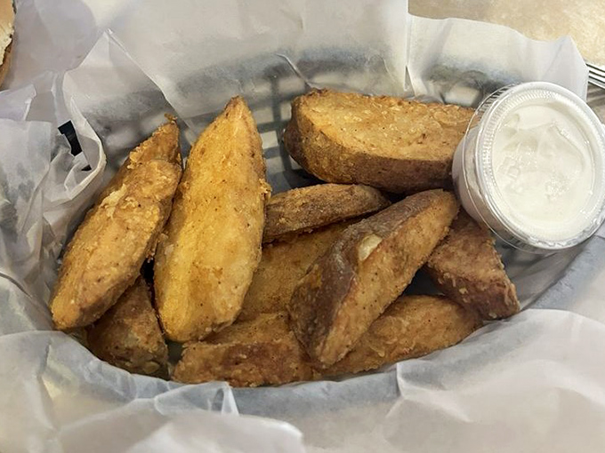 Potato wedges seasoned to golden perfection - the supporting actor that quietly steals every scene it's in.