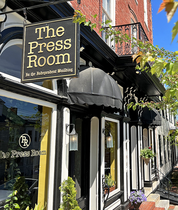 The Press Room's elegant sign and awning promise sophisticated dining in a historic setting&mdash;journalism's loss is definitely the culinary world's gain.