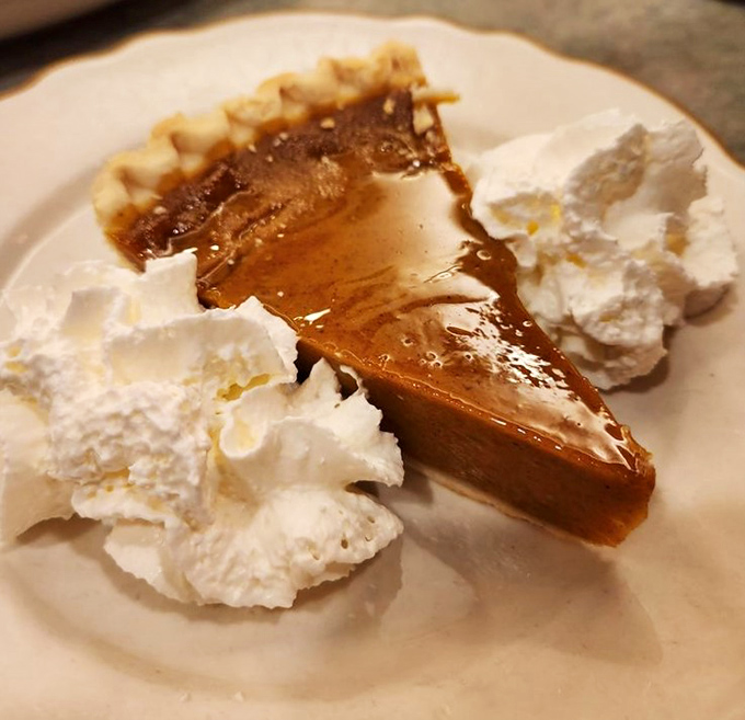 Pumpkin pie that would make your grandmother both jealous and proud. That whipped cream crown is well-deserved.