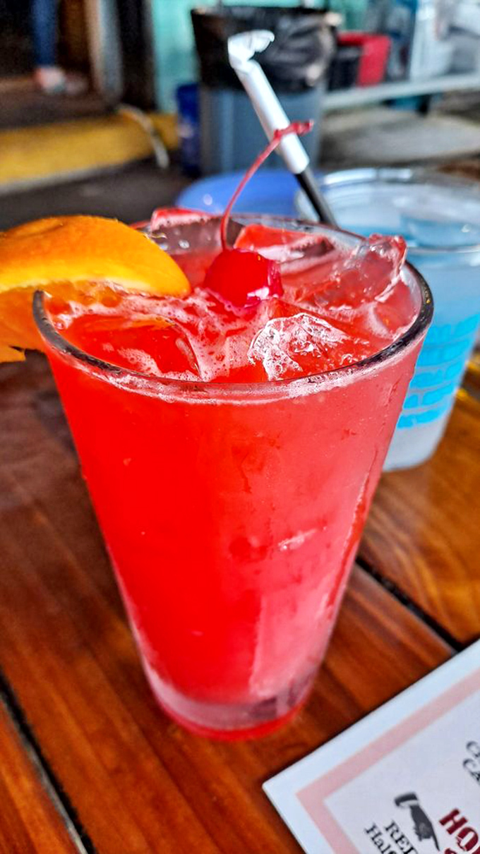 This rum punch isn't just a drink&mdash;it's liquid sunshine with a cherry on top. The perfect companion for watching fishing boats return to harbor.