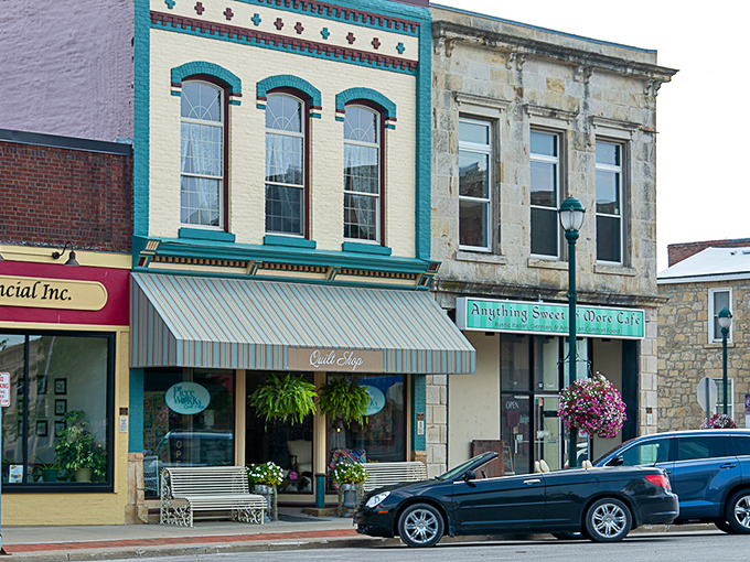 Colorful storefronts like these give Winterset's downtown its distinctive character&mdash;where shopping local isn't a trend, it's simply how things are done.
