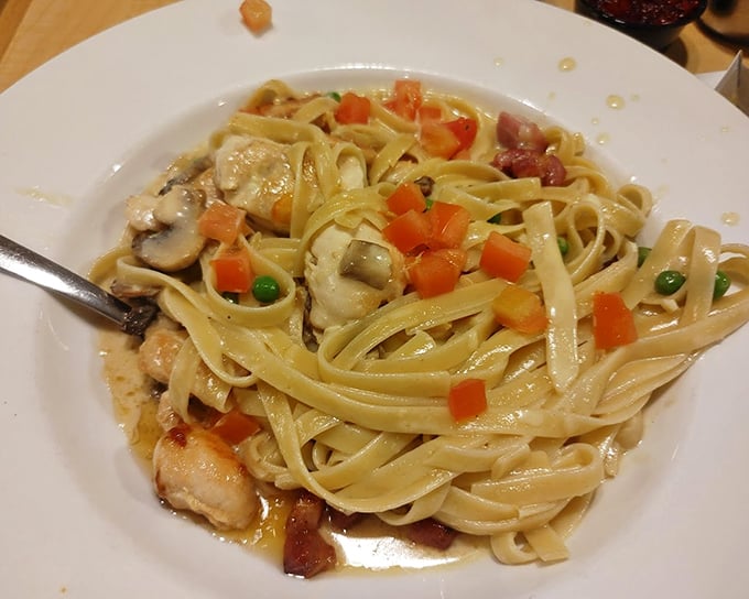 Fettuccine that's dressed for success with tender chicken, colorful vegetables, and a sauce that clings lovingly to each pasta strand.