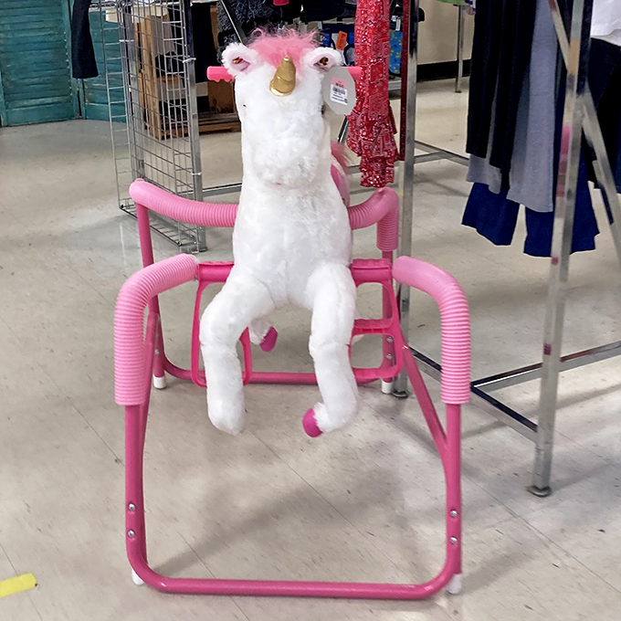 Just when you think you've seen it all, a majestic unicorn appears, perched on pink supports like royalty awaiting its next adventure.