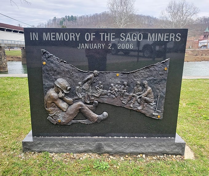 A solemn reminder of West Virginia's mining heritage stands near the bridge, honoring the Sago miners in a touching memorial that connects past to present.