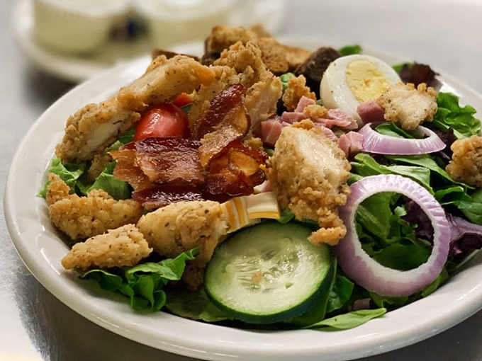 Even the salads here look like they're trying to earn their place among the comfort classics.