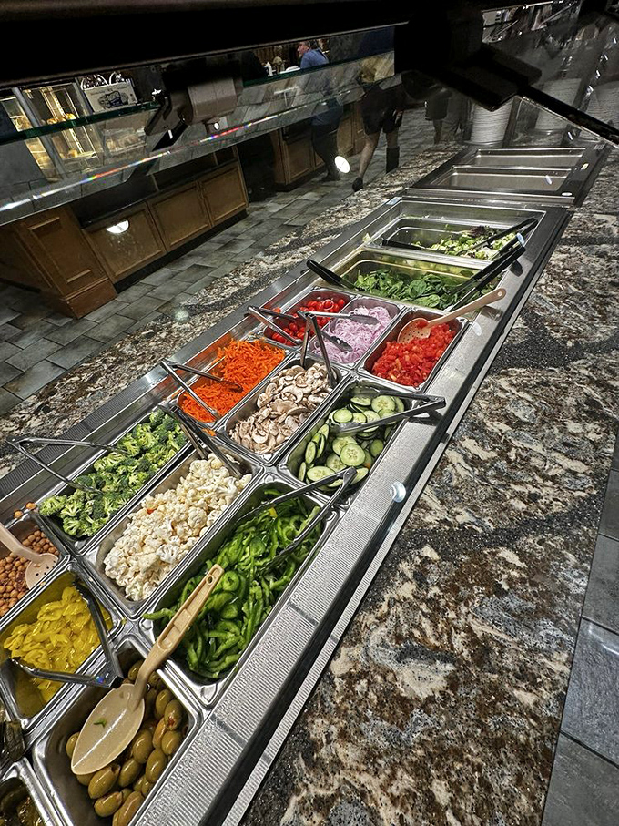 The salad bar of champions. Fresh, vibrant, and extensive enough to make you forget you came for the fried chicken.