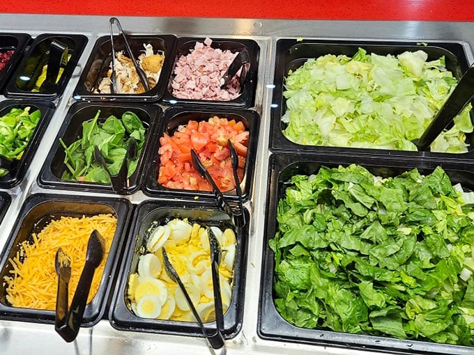 The salad bar offers fresh ingredients for those who want to pretend they're eating healthy before diving into a plate of barbecue.