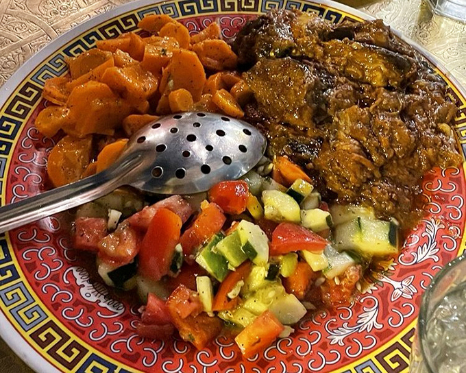 A trio of vibrant salads shares plate space with succulent meat&mdash;proof that Moroccans understood the perfect balance of flavors long before "balanced eating" became trendy.