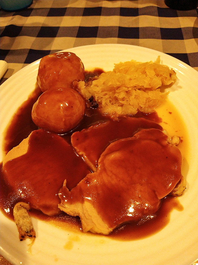 Schweinebraten with potato dumplings and sauerkraut&mdash;the kind of meal that makes you want to yodel with joy, even if you've never yodeled before.