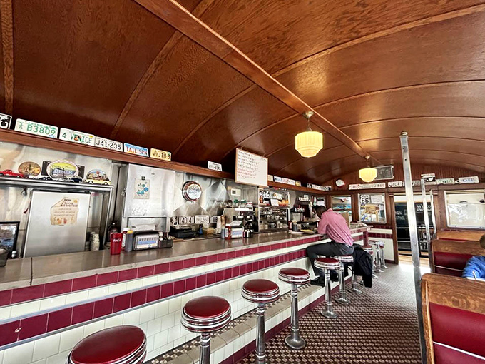 The classic counter at Dinky's Blue Belle Diner isn't just a place to eat&mdash;it's front-row seating to a breakfast symphony conducted on a well-seasoned griddle.