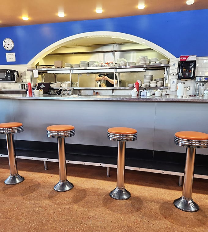 The counter where breakfast dreams come true, complete with classic diner stools that have supported countless Minneapolis mornings.