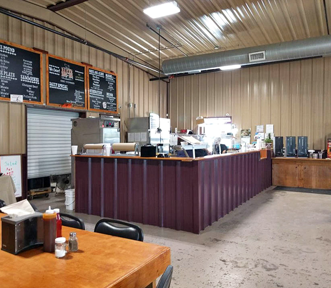 The counter where dreams come true, one slice of brisket at a time, with menu boards that read like poetry to the hungry traveler.