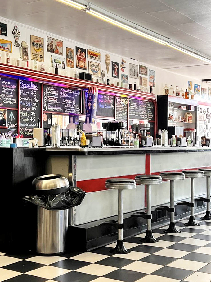 The counter isn't just where orders happen&mdash;it's command central for milkshake magic, where soda jerks orchestrate fizzy symphonies with practiced hands.